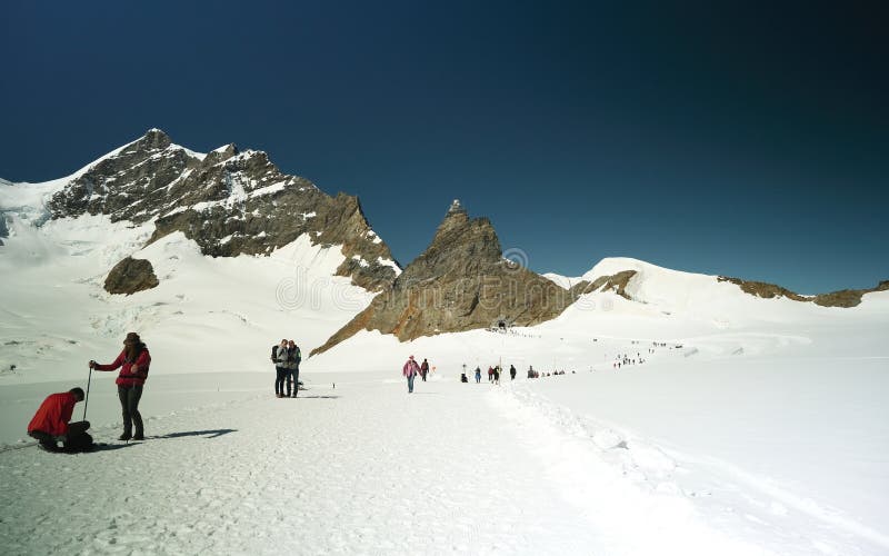 Top of Europe in Switzerland. People are Hiking Up Towards the Peak of ...