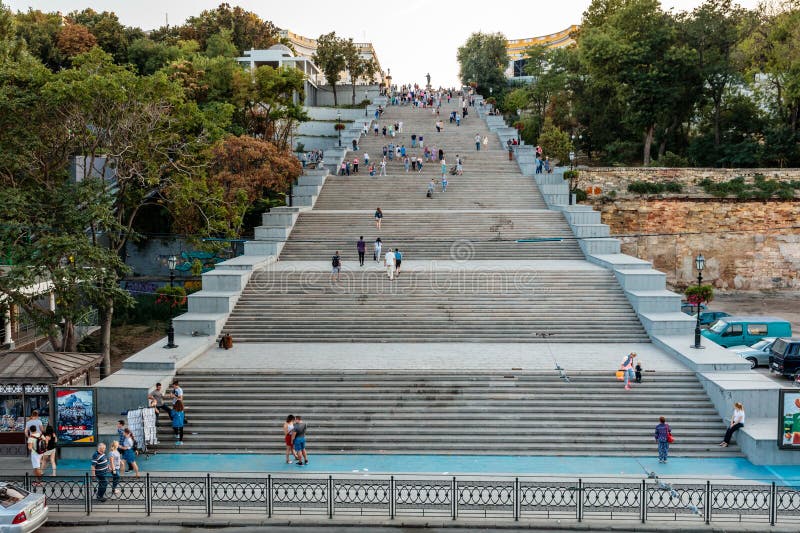 A Group of People are Walking Up a Very Steep Set of Stairs Editorial ...