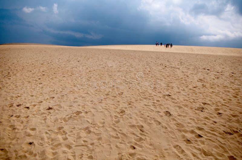 Group of People Wandering through Desert Stock Image - Image of ...