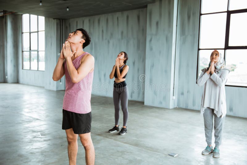 A Group of People Warming Up before Doing Core Gymnastics Stock Photo ...