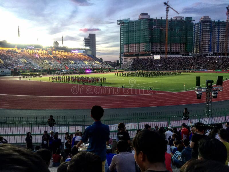 Group of People Watching Football Player Team on Field Stock Photo ...