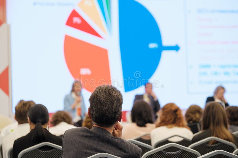 Group of People Watching Presentation on Large Screen Editorial Stock ...