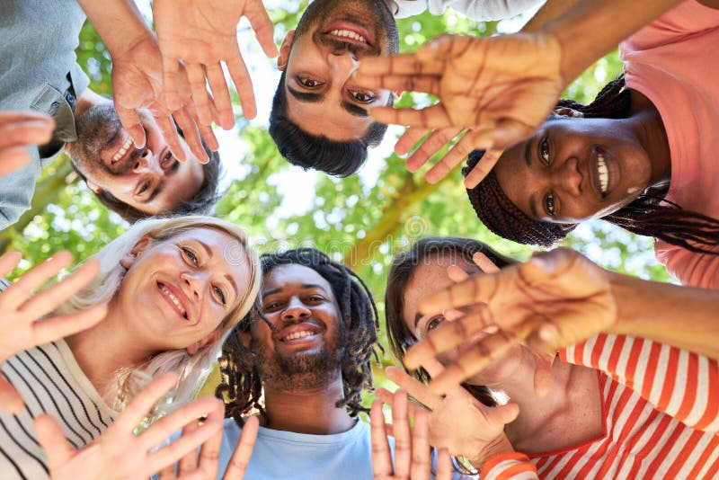 Group of People Waving in the Team Building Workshop Stock Image ...