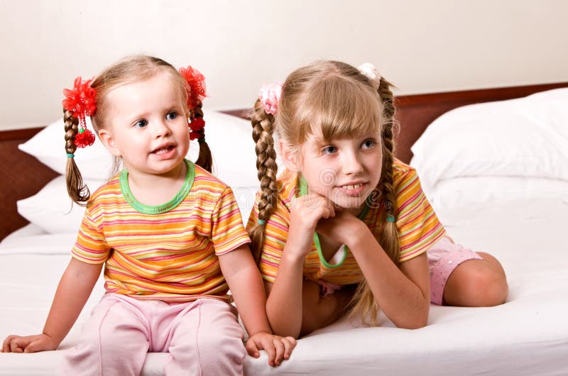 Group of People on White Bed with Headboard. Stock Photo - Image of ...