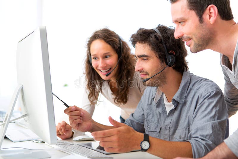 Group of People Working Around a Computer Stock Image - Image of ...