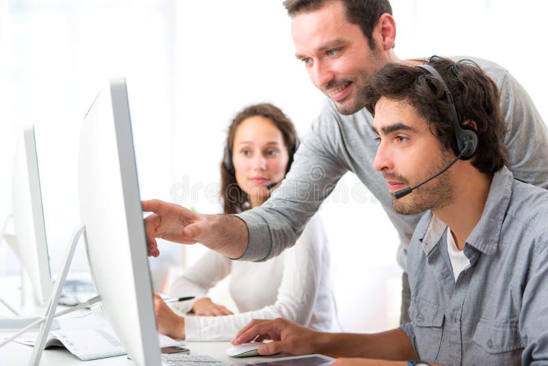 Group of People Working Around a Computer Stock Photo - Image of ... Group of People Working Around a Computer Stock Photo - Image of ...