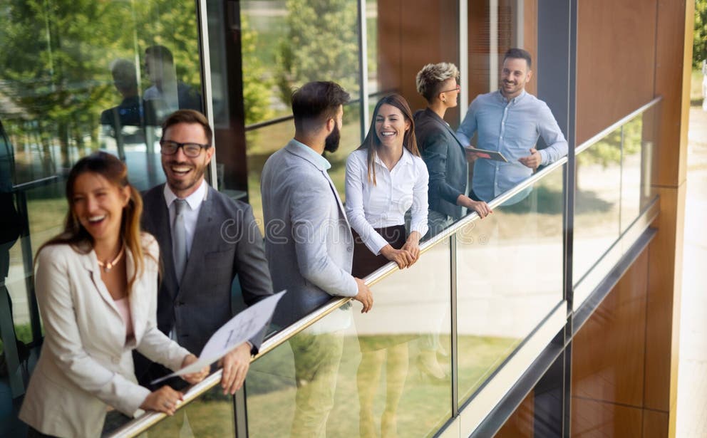 Group of Perspective Designers Discussing in Front of Office Stock ...