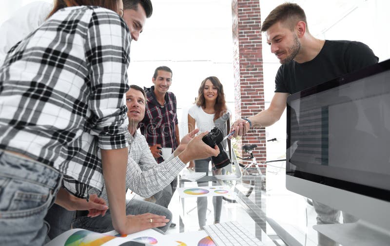 Group Photo of Editors Working in a Modern Office. Stock Image - Image ...
