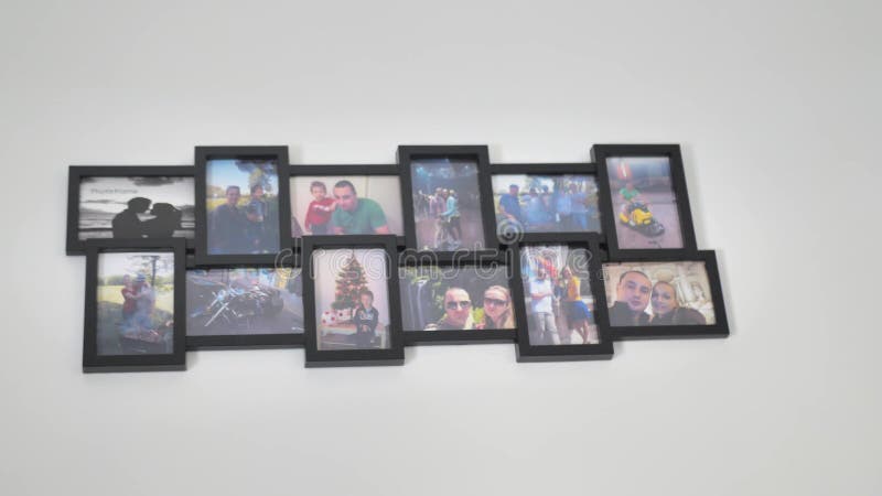 Group of Photo Frames on White Wall, Tracking Shot Stock Video - Video ...