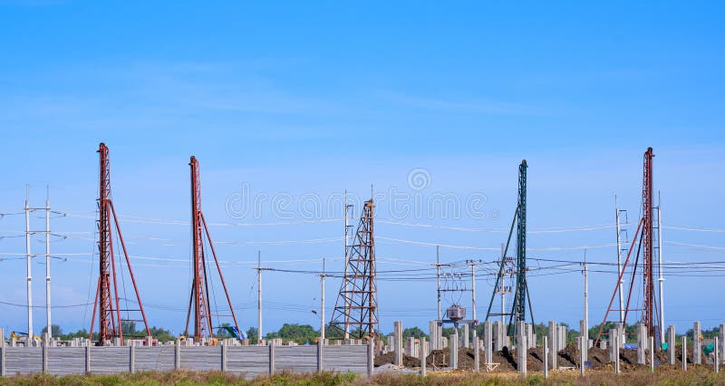 Group of Pile Driver Machines are Installing Precast Concrete Piles on ...
