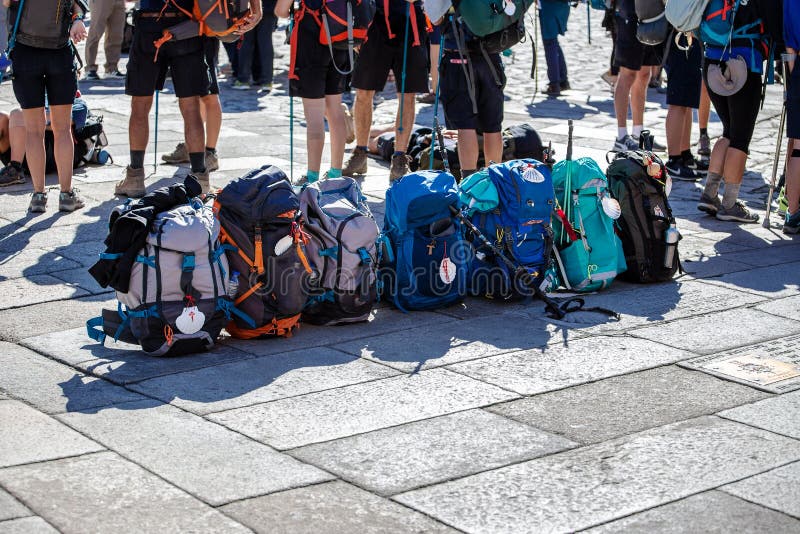 Group of Pilgrim Backpack in a Row on Paving Stone of Obradoiro Square ...