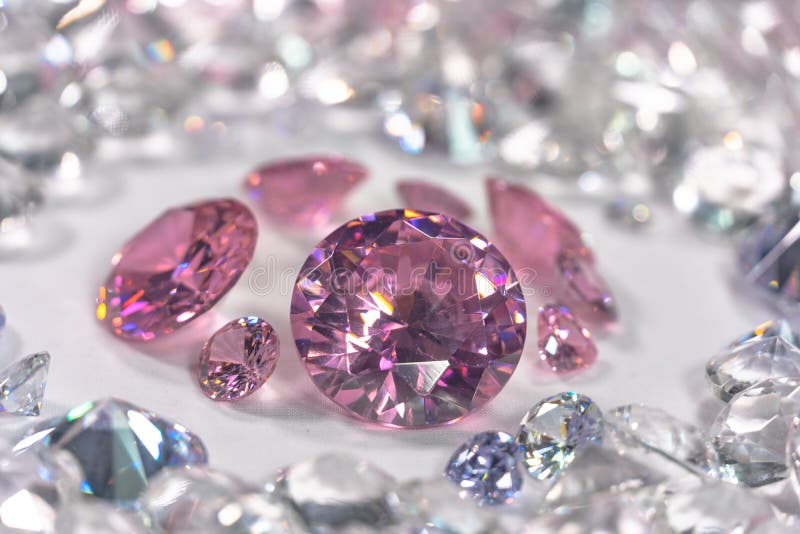 A Group of Pink Diamonds Arranged in the Middle of White Diamonds in a ...
