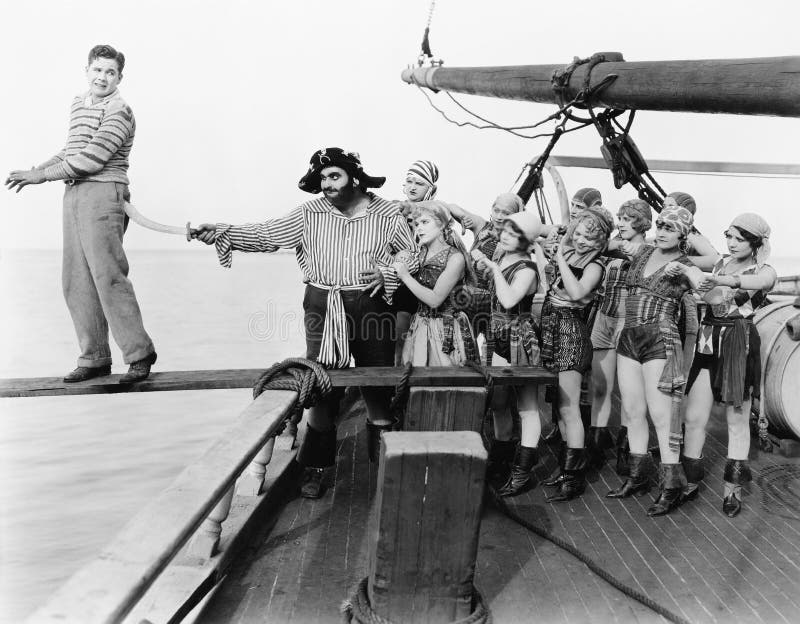 Group of Pirates Trying To Push a Young Man Over a Plank Stock Image ...