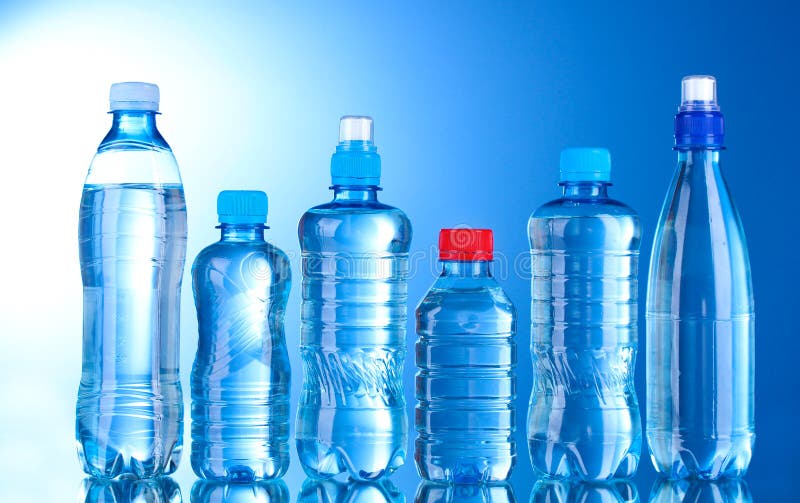 Group of Plastic Bottles with Water. Isolatedon Wh Stock Image - Image ...