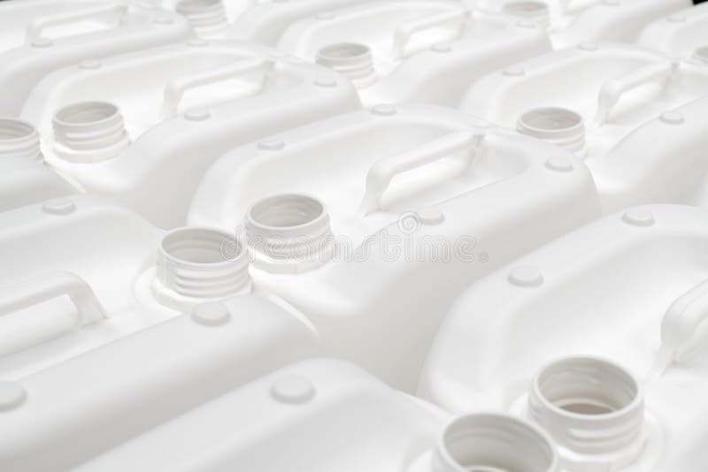 A Group of Plastic Jerry Cans Stock Photo - Image of industrial, focus ...
