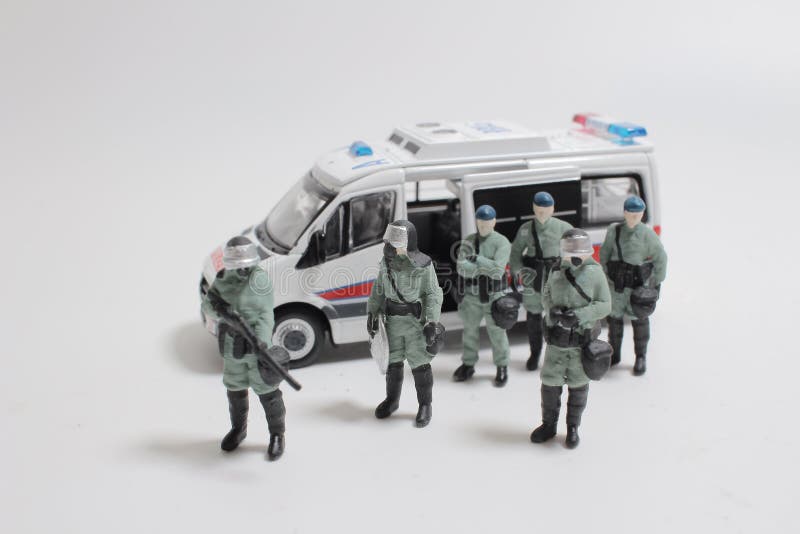 A Group of Police Figure with Car on Board Stock Photo - Image of ...