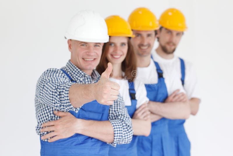 Group portrait of workers stock image. Image of crossed - 137761507