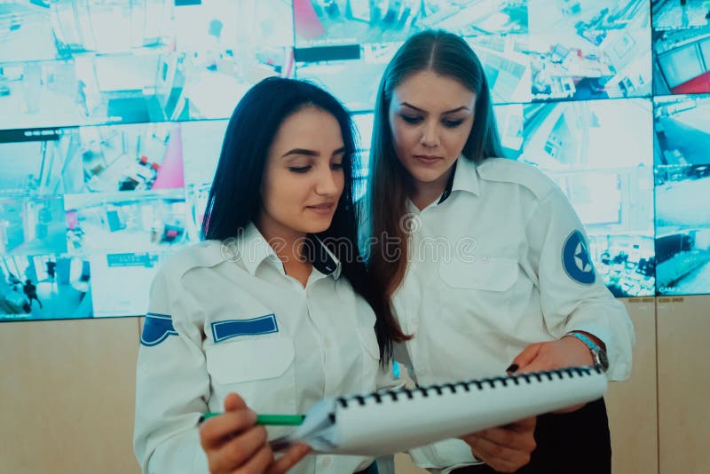Group Portrait of Female Security Operator while Working in a Data ...