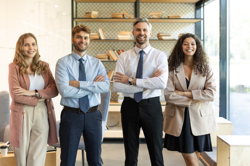 Group Portrait of a Professional Business Team Looking Confidently at ...