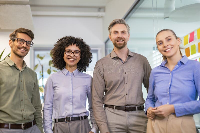 Group Portrait of a Professional Business Team Standing in Modern ...