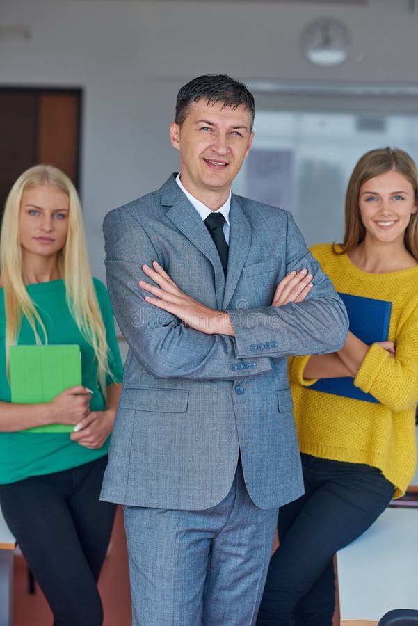 Group Portrait of Teacher with Students Stock Image - Image of learning ...