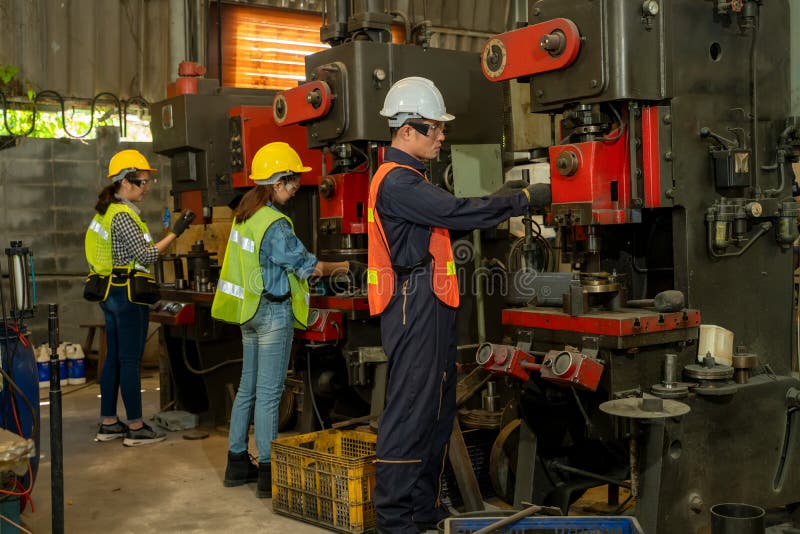 Group Portrait of a Team of Engineers Working at Factory Stock Photo ... Group Portrait of a Team of Engineers Working at Factory Stock Photo ...