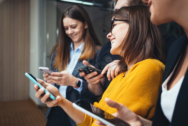 Group of Positive Business People Working Together and Using Modern ...