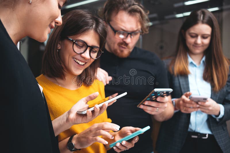 Group of Positive Business People Working Together and Using Modern ...