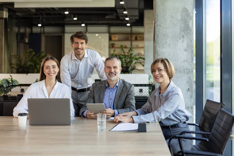 Group of Positive Successful Modern People Sitting in Office and ...