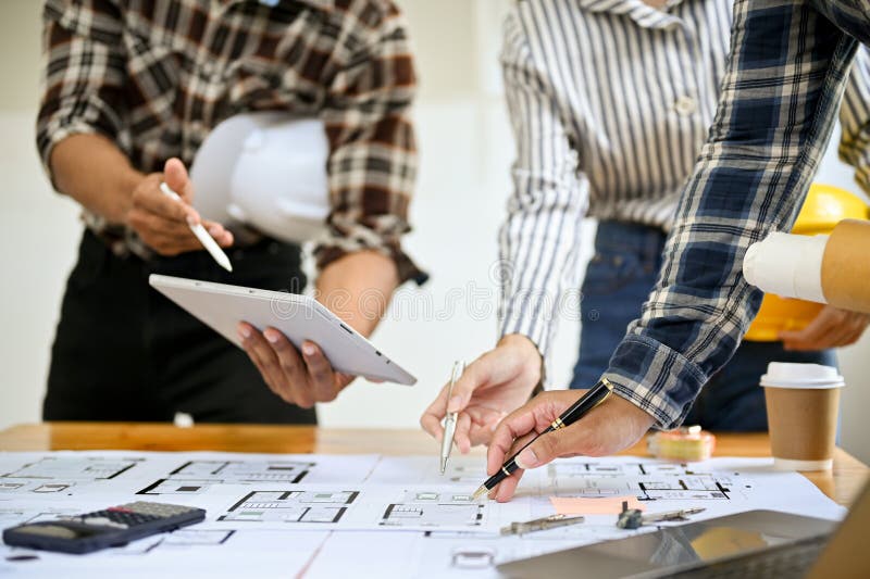 Group of Professional Asian Engineer are Working Together, Using Tablet ...