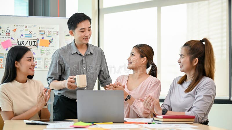 A Group of Professional Asian Tech Developers is in the Meeting ...
