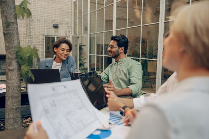 Group of Professional Business Managers Working with Project Documents ...