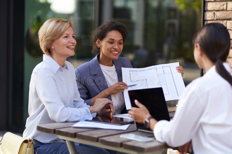 Group of Professional Business Managers Working with Project Documents ...