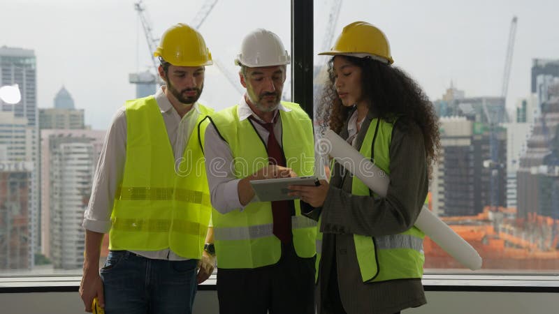 Group of Professional Civil Engineers Team Working on New Building ...