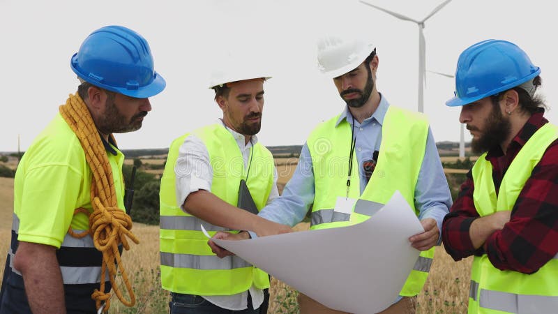 Group of Professional Engineer People Working at Wind Will Turbine ...