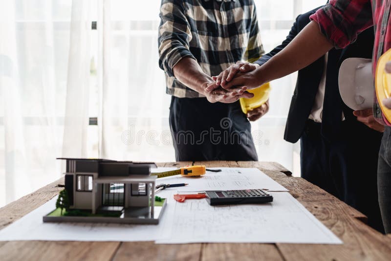 Group of Professional Engineering People Brainstorming at Meeting and ...