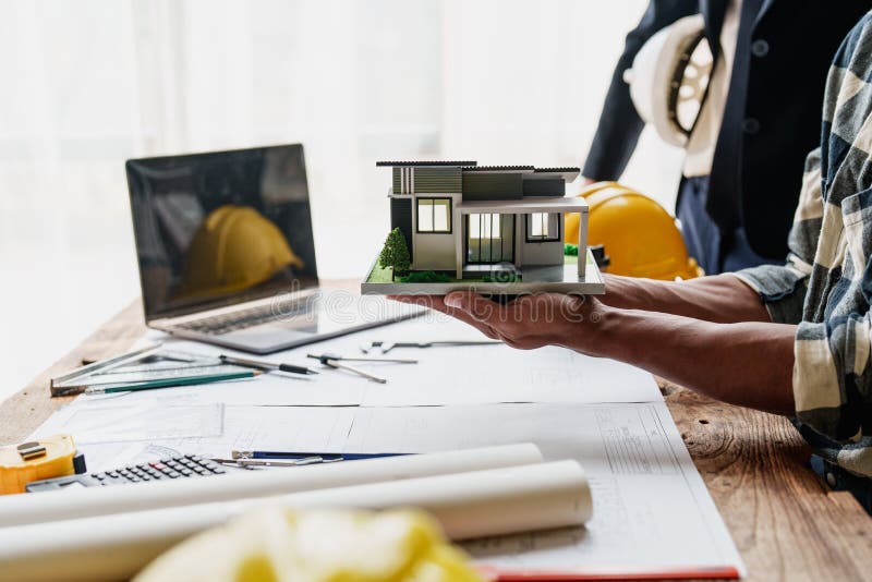 Group of Professional Engineering People Brainstorming at Meeting and ...