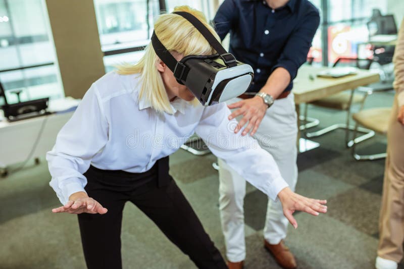 Professional People Playing with VR Glasses on the Work in the Modern ...