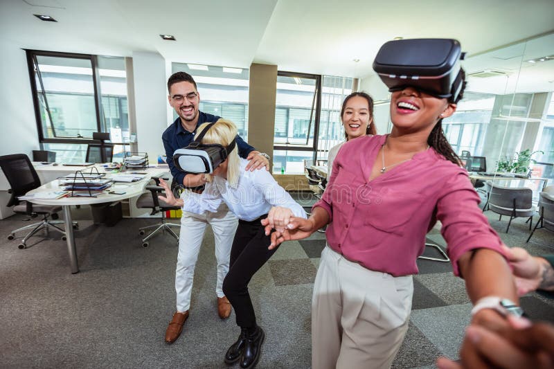 Professional People Playing with VR Glasses on the Work in the Modern ...