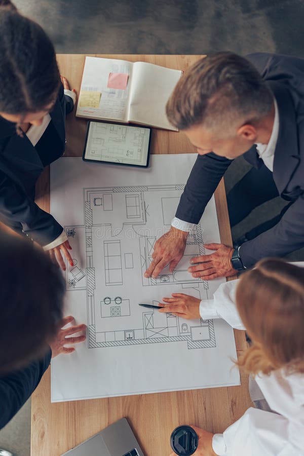 Group of Professional Team Design Engineers Working with Project ...