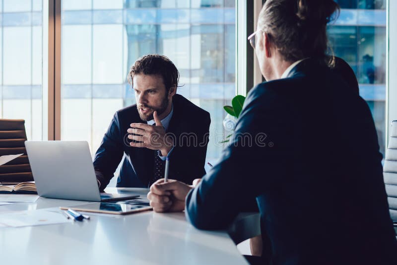 Group of Professionals Brainstorming and Sharing Ideas. Stock Photo ...