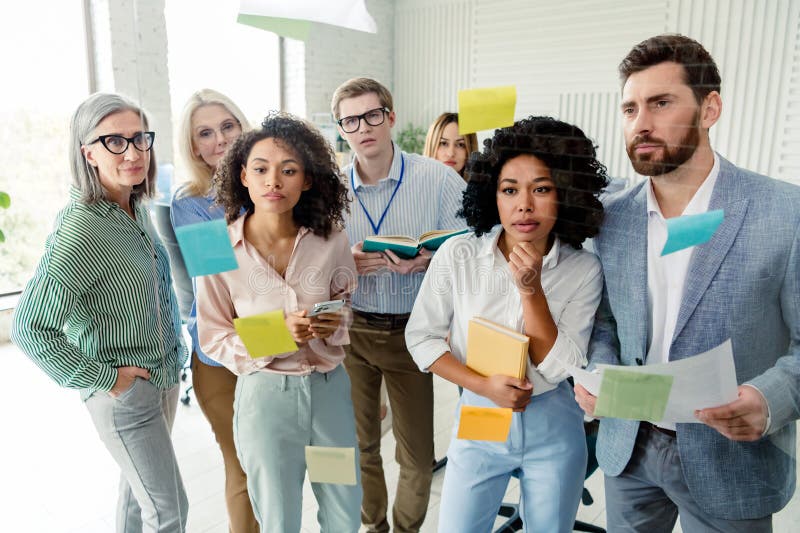 Group of Professionals Collaborating in an Office Setting with Creative ...