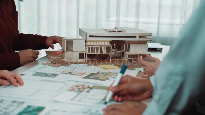 Collaborative Interior Design Meeting with Architectural Plans, Color ...