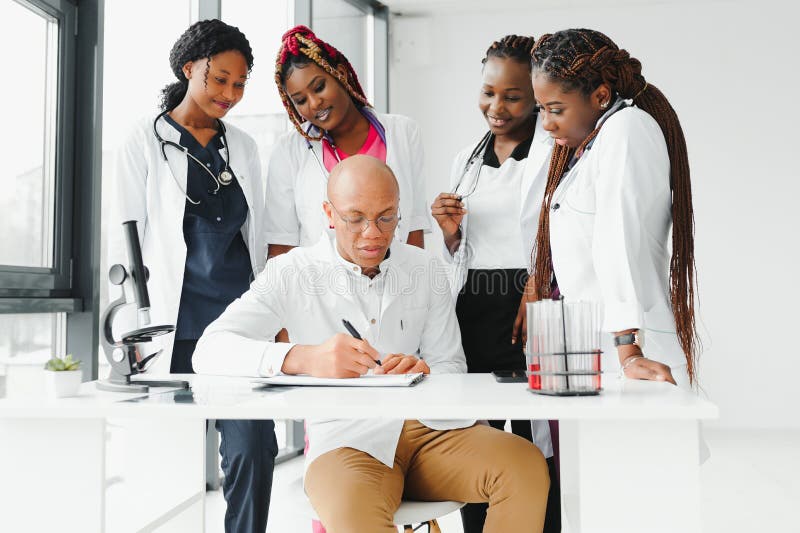 Group of Professionals Medical Workers Working Together. Stock Photo ...