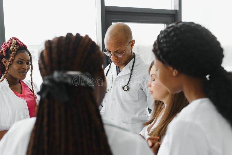 Group of Professionals Medical Workers Working Together. Stock Photo ...