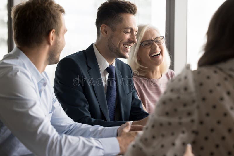 Group Professionals Smiling Laughing Engaged Conversation Stock Photos ...