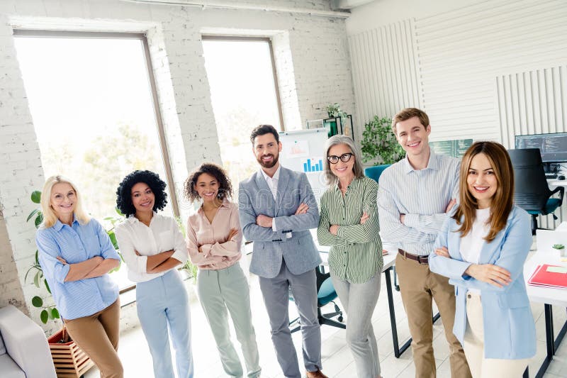 Group of Professionals Working in a Stylish Office Setting with a ...