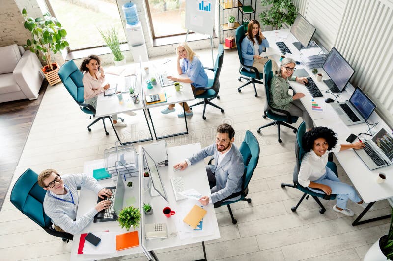 Diverse Team Working Collaboratively in Modern Office Setting ...