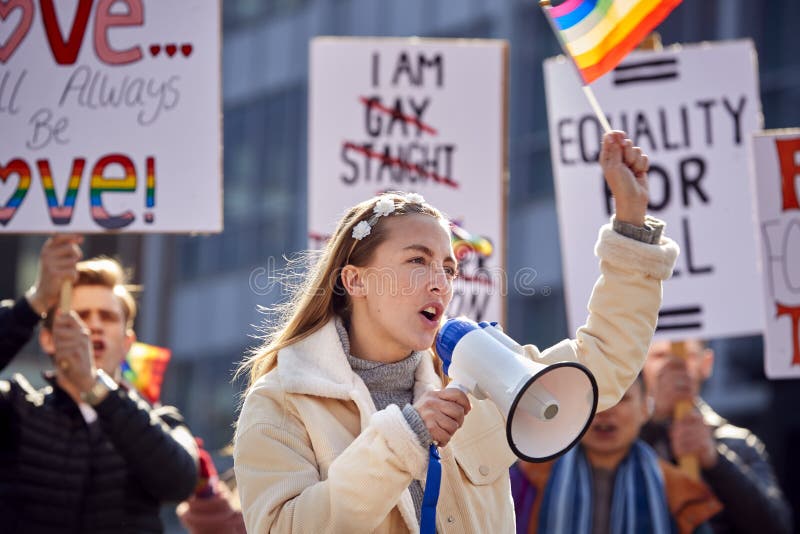 Group of Protestors with Placards and Megaphone on Demonstration March ...