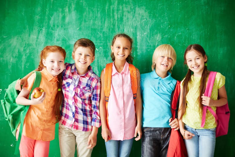 Group of pupils stock photo. Image of junior, book, looking - 25940102